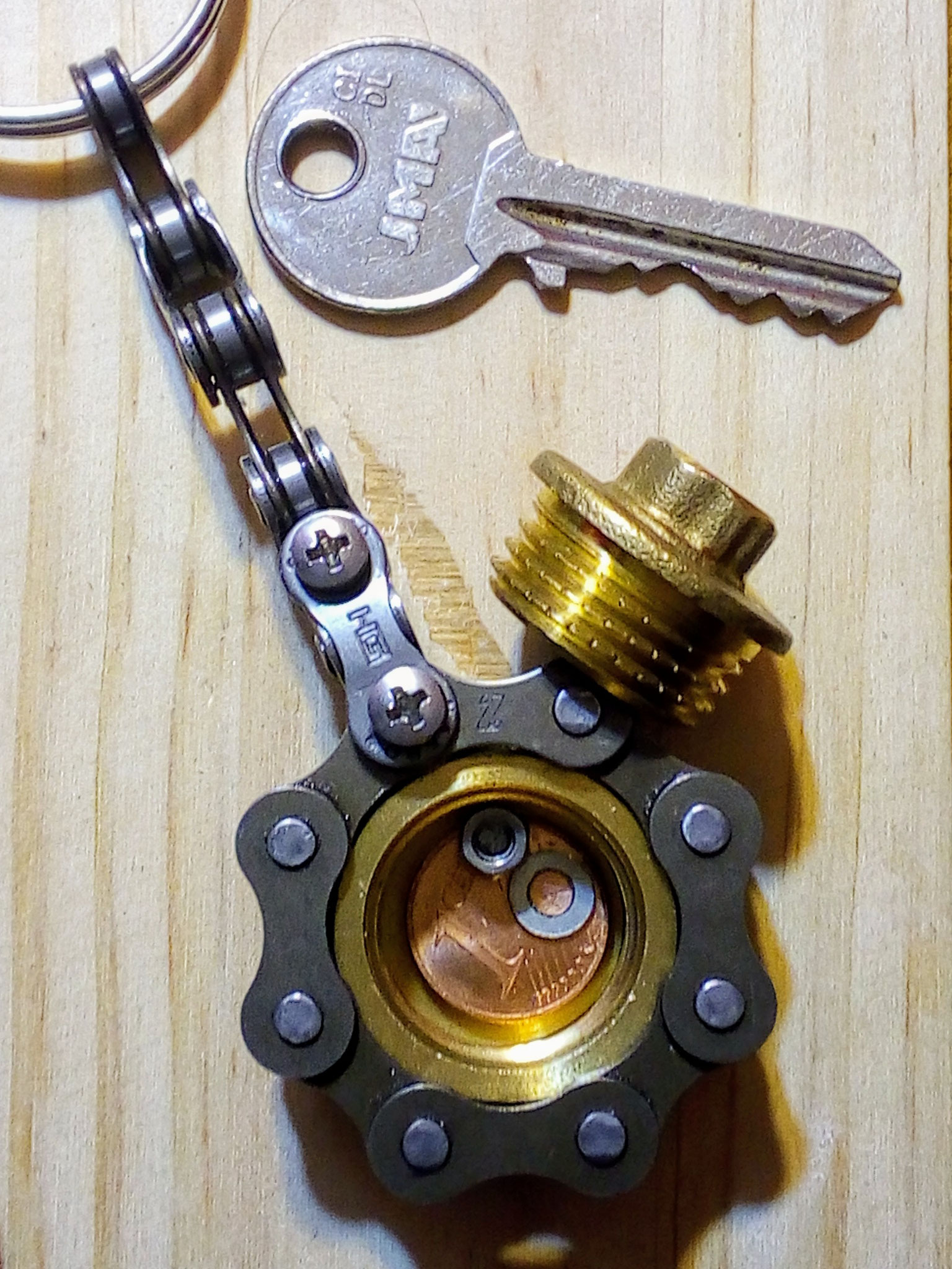 Unique handmade Bicycle chain art work - swisstrailbell® meets bicycle ...