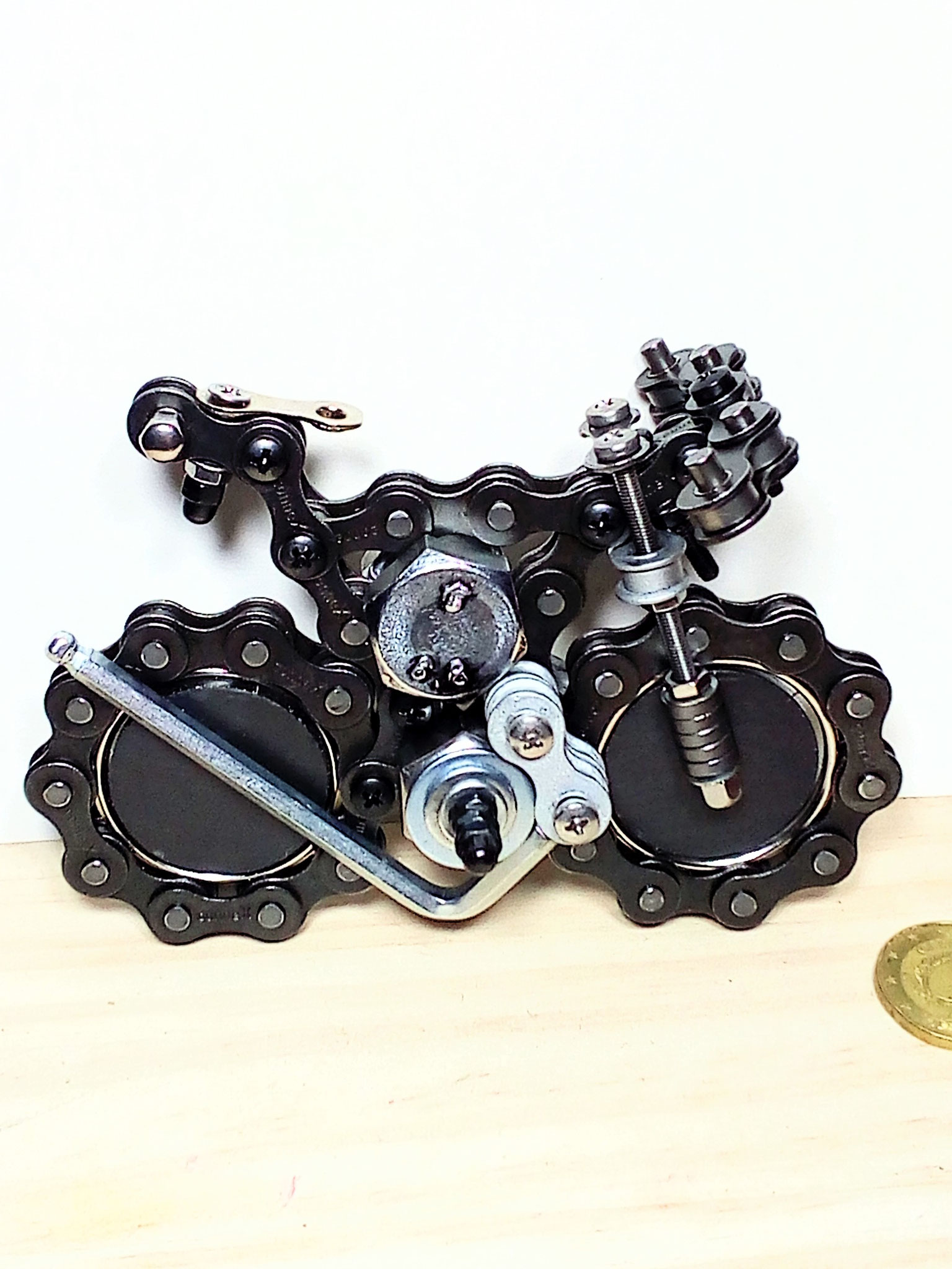 Unique handmade Bicycle chain art work - swisstrailbell® meets bicycle ...