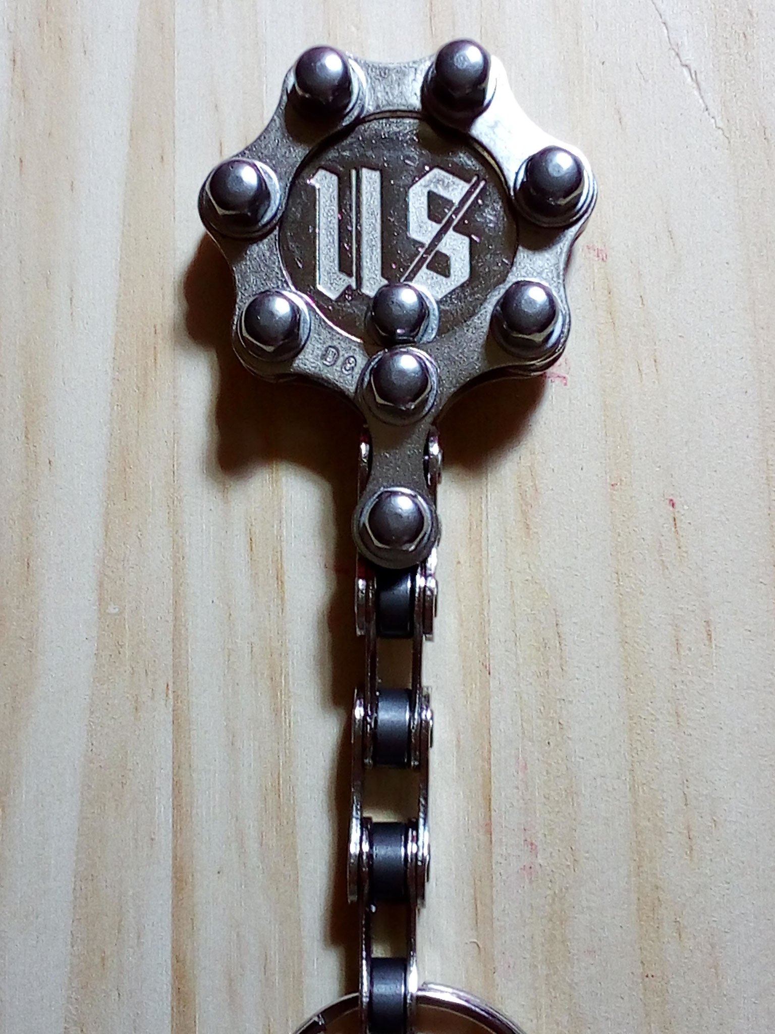 with coins - swisstrailbell® meets bicycle chain art