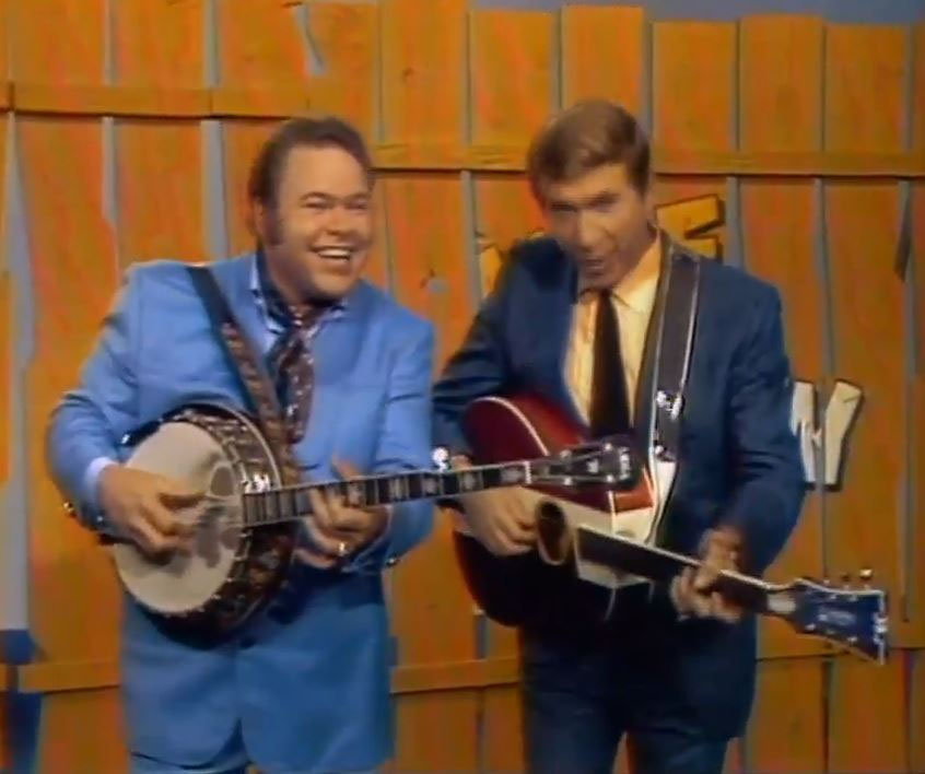 Buck Owens And Roy Clark - Hee Haw Theme Song - when the cowboy sings