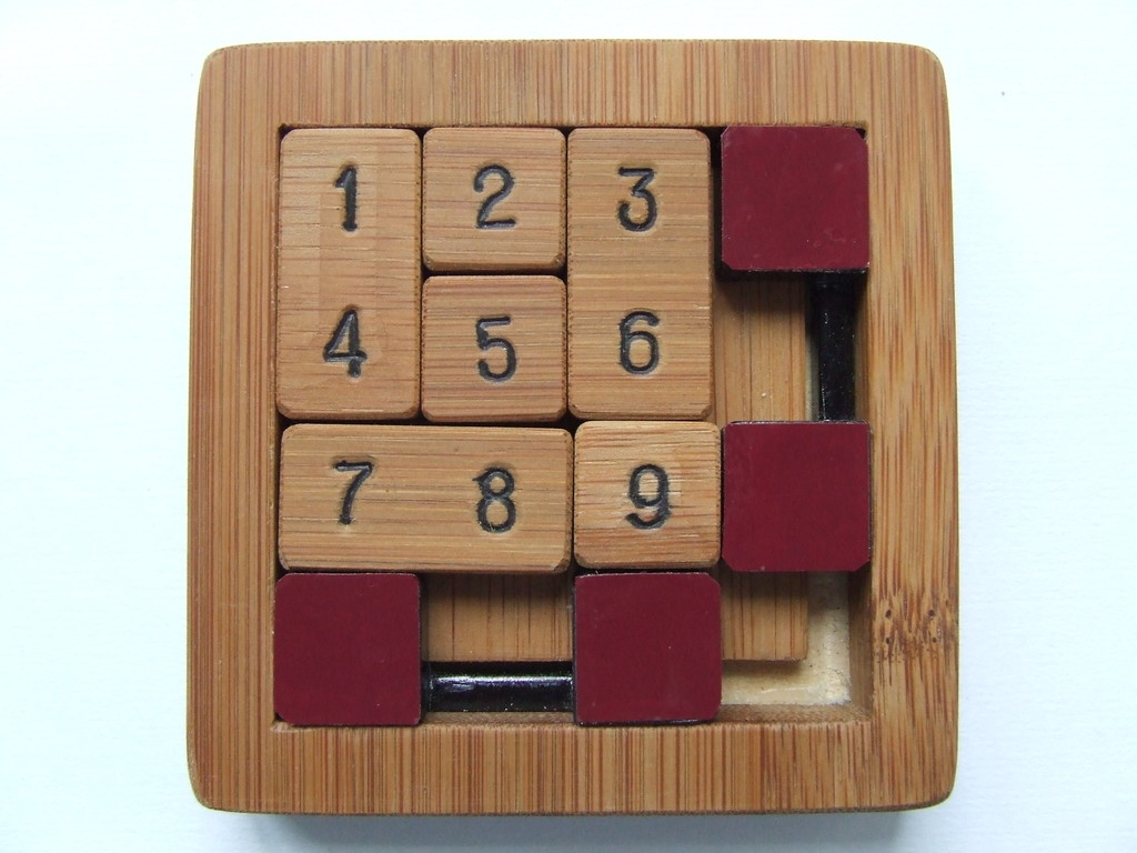 Sliding block puzzle with images of M.C. Escher - wittingen-puzzels's ...