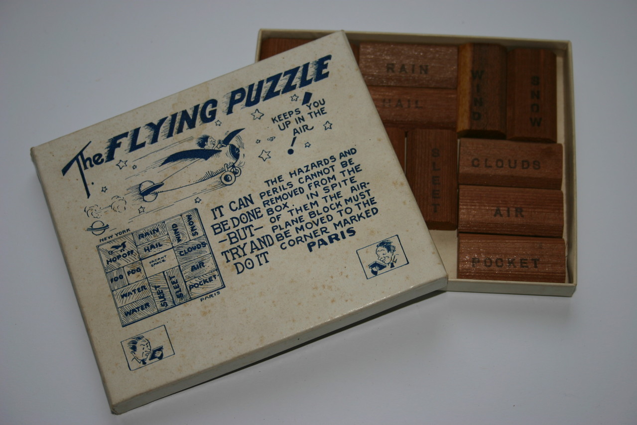 Sliding block puzzle with images of M.C. Escher - wittingen-puzzels's ...