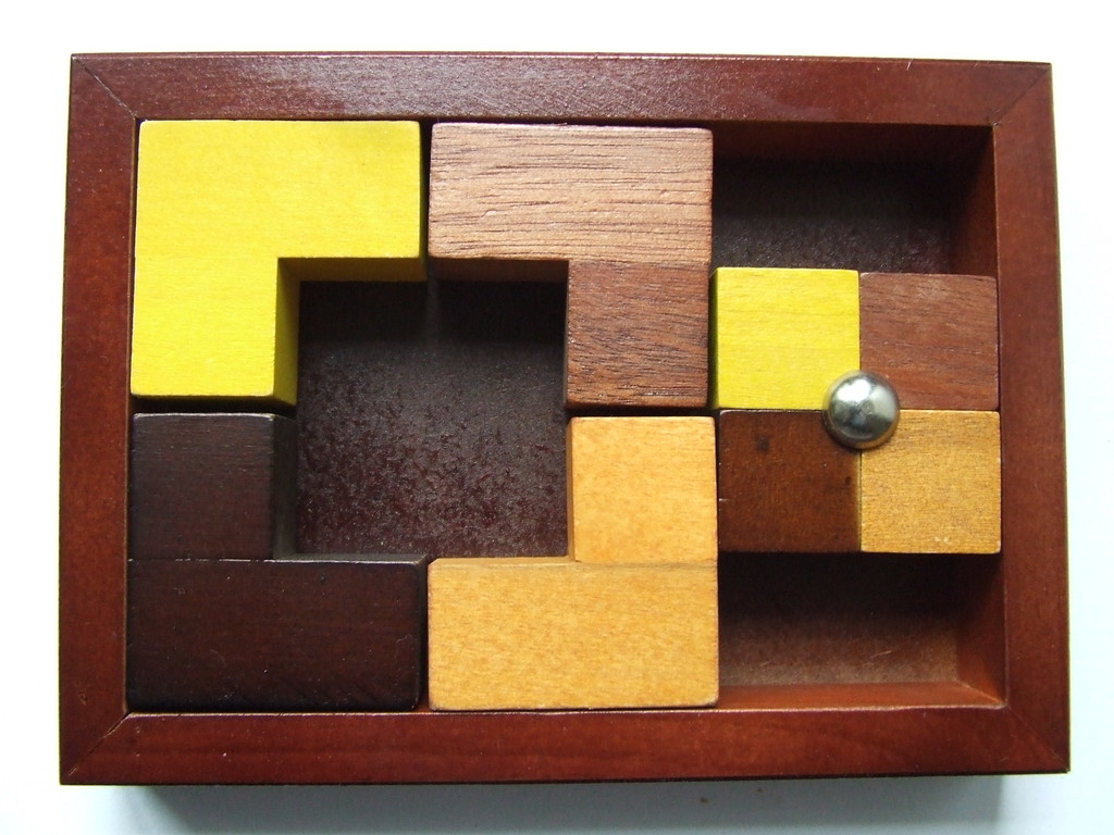 Sliding block puzzle with images of M.C. Escher - wittingen-puzzels's ...