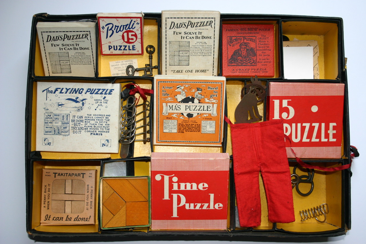 Sliding block puzzle with images of M.C. Escher - wittingen-puzzels's ...