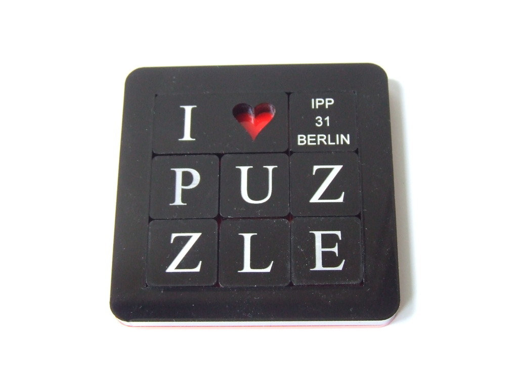 Sliding block puzzle with images of M.C. Escher - wittingen-puzzels's ...