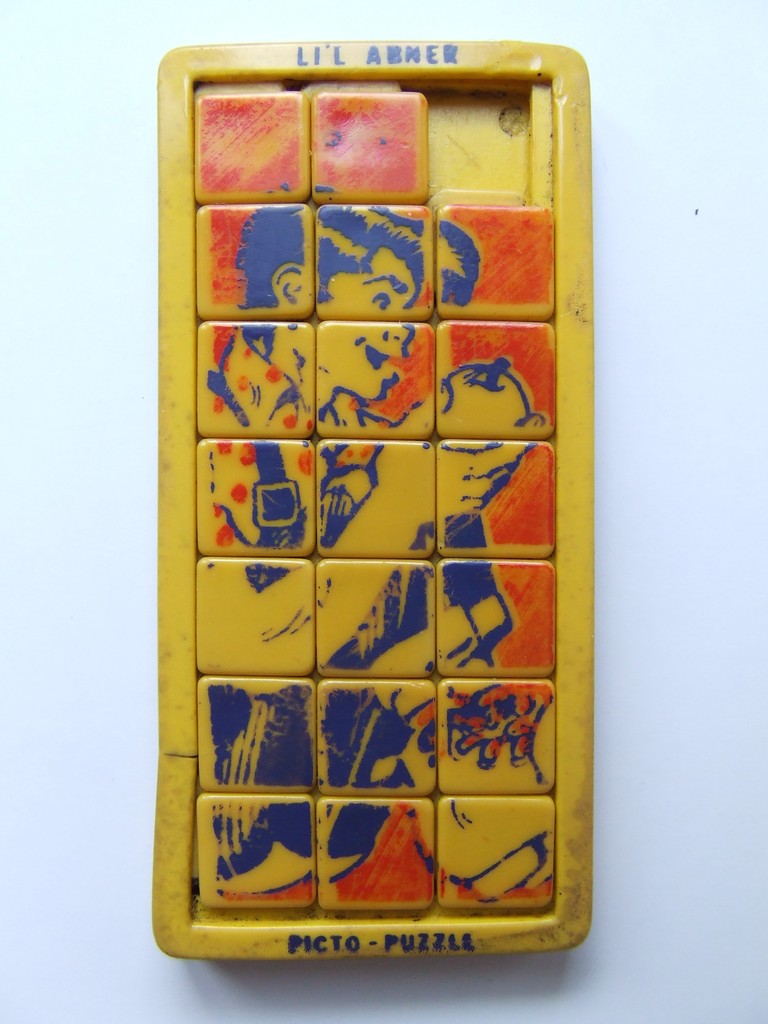 Sliding block puzzle with images of M.C. Escher - wittingen-puzzels's ...