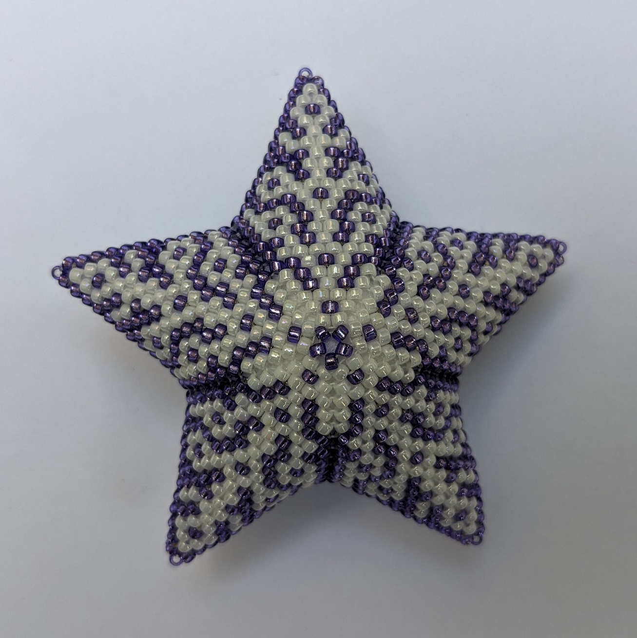 Perlensterne mit eigenem Muster - maries-perlentieres Webseite!