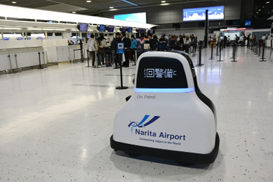 The security robot "Kokobo" patrolling at Narita International Airport ...